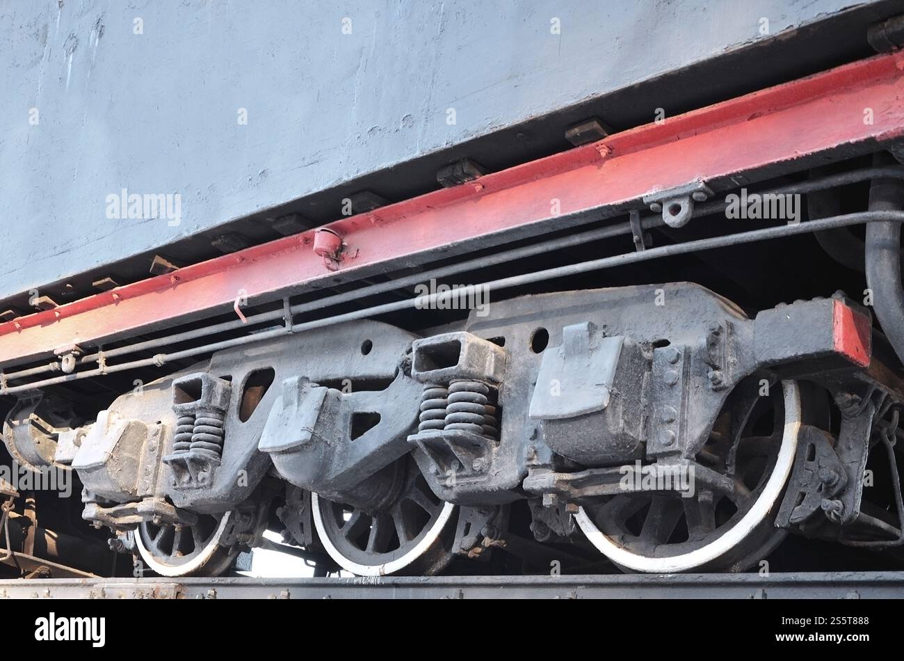 Black wheels of an old USSR locomotive. Vintage wheels of an old soviet ...