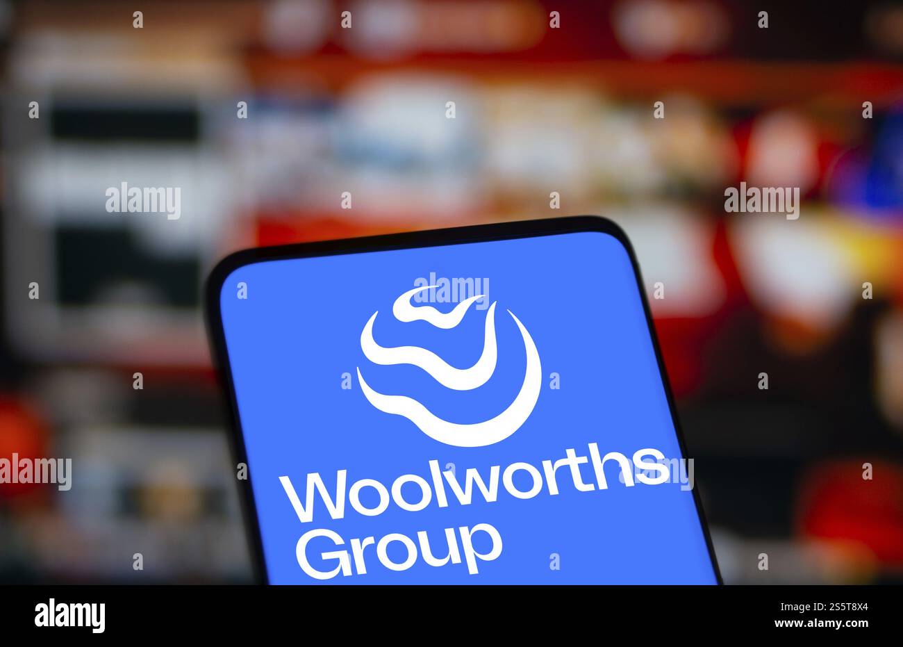 Woolworths group logo is displayed on smartphone. Woolworths Group ...