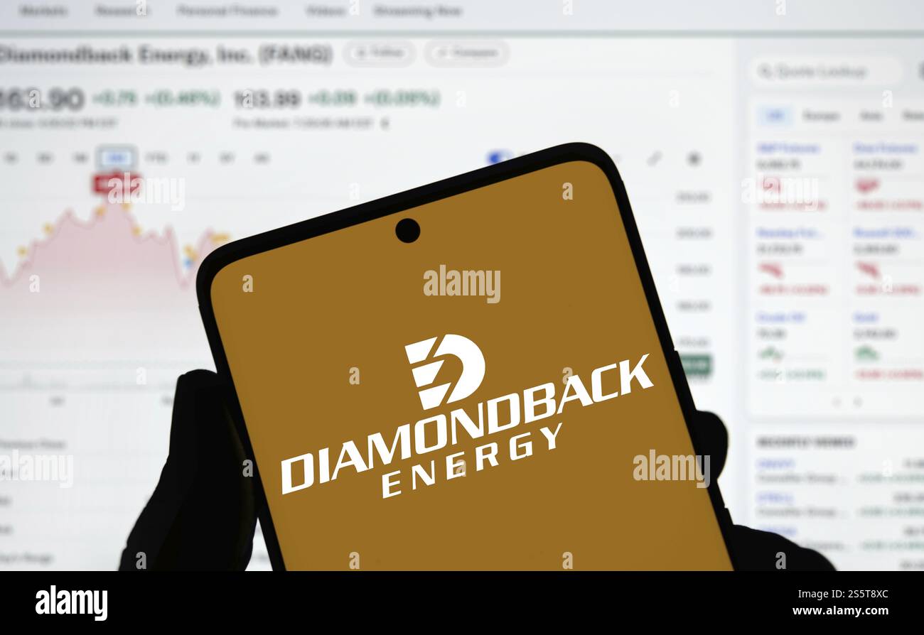 Diamond back energy logo is displayed on smartphone. Diamondback Energy ...