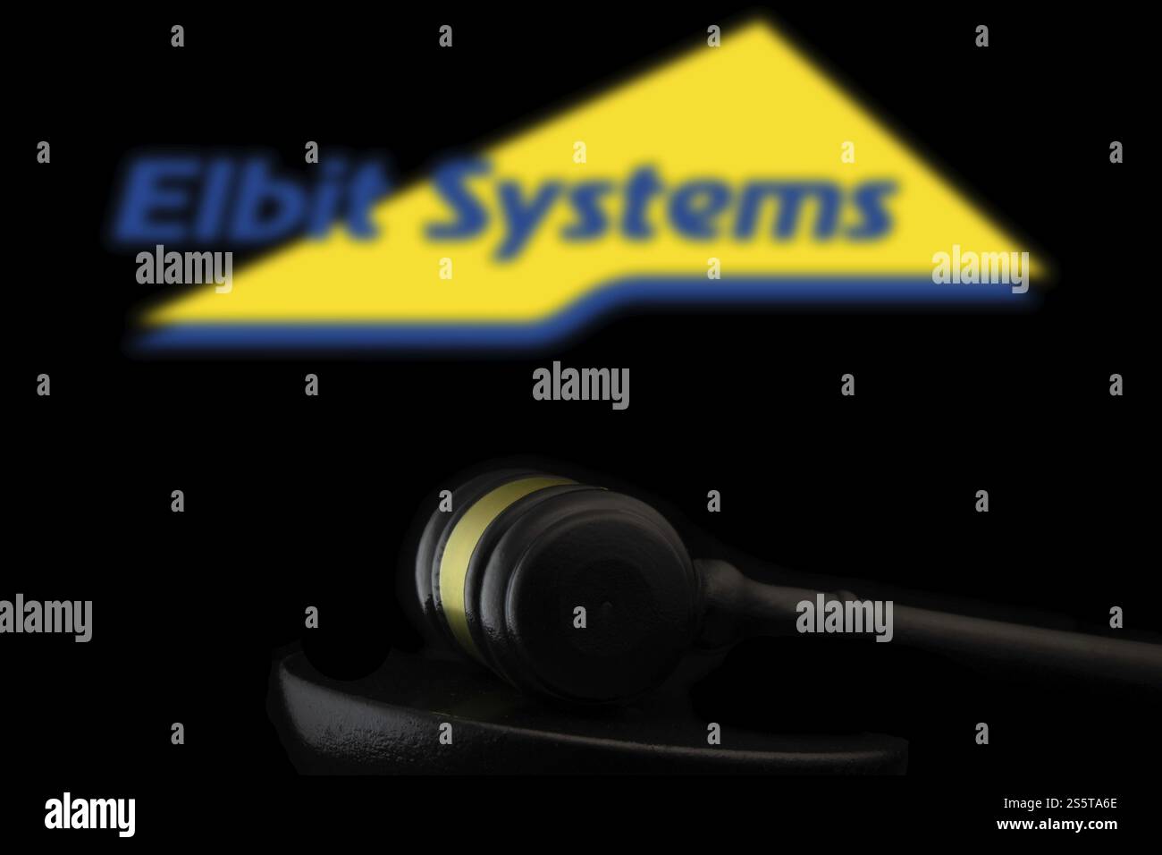 Court gavel in front of the Elbit systems logo. Elbit Systems Ltd is an ...