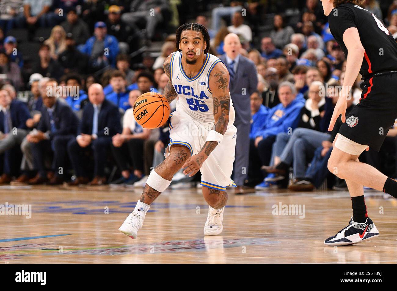 INGLEWOOD, CA - DECEMBER 28: UCLA Bruins guard Skyy Clark (55) dribbles ...
