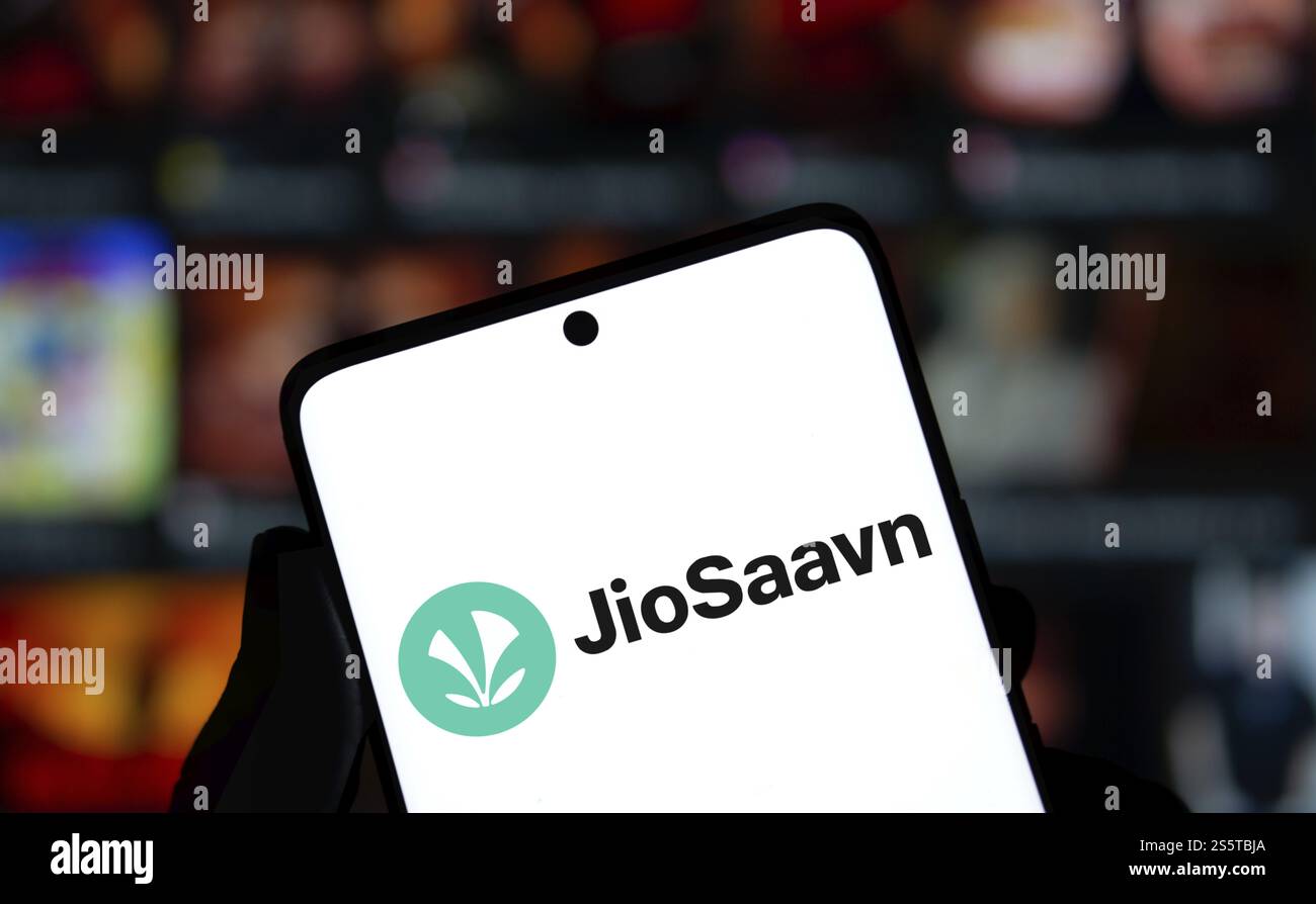 JioSaavn logo is displayed on smartphone. JioSaavn is an Indian music ...