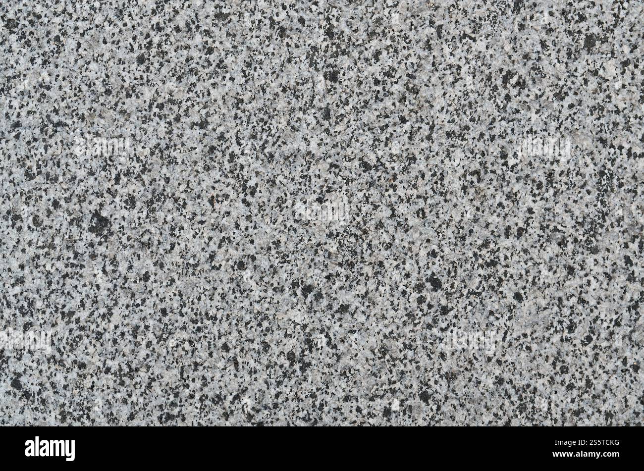 Monochromatic texture of granite surface. Detailed photo of the treated ...