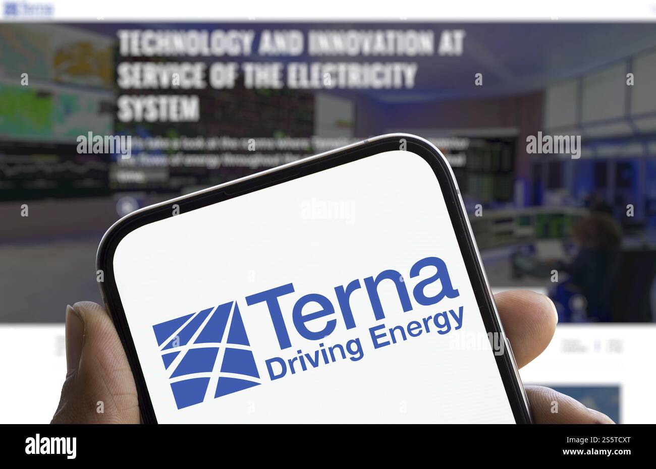 Terna driving energy logo is displayed on smartphone. Terna S.p.A. is a ...