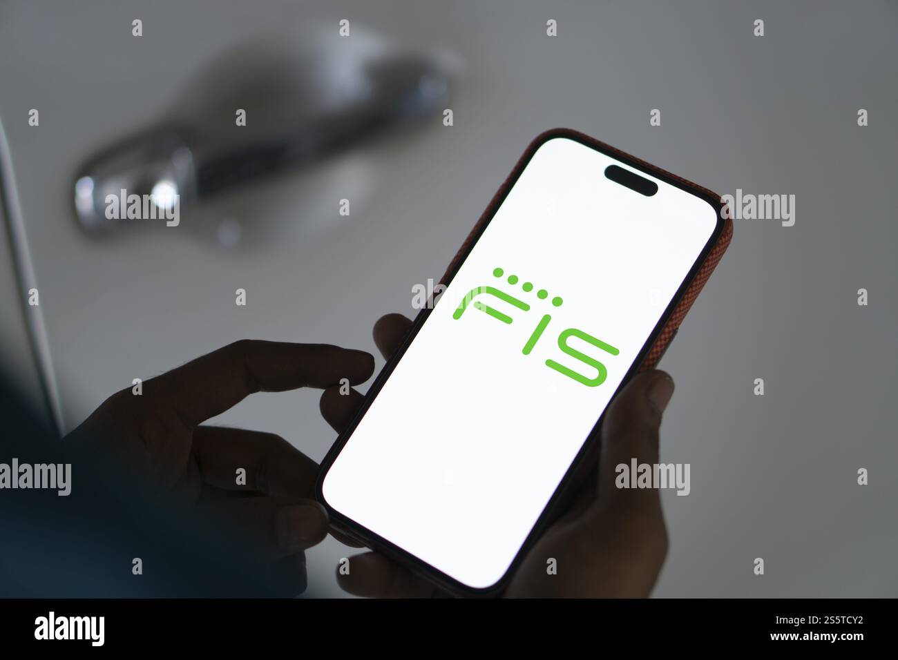 fis logo is displayed on smartphone. Fidelity National Information ...