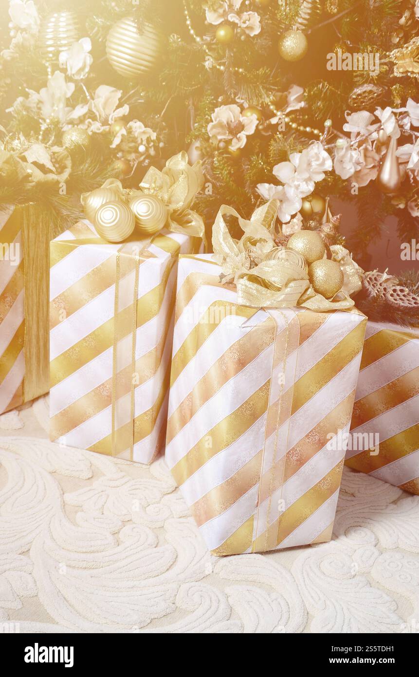 Shiny christmas tree gift boxes hi-res stock photography and images - Alamy