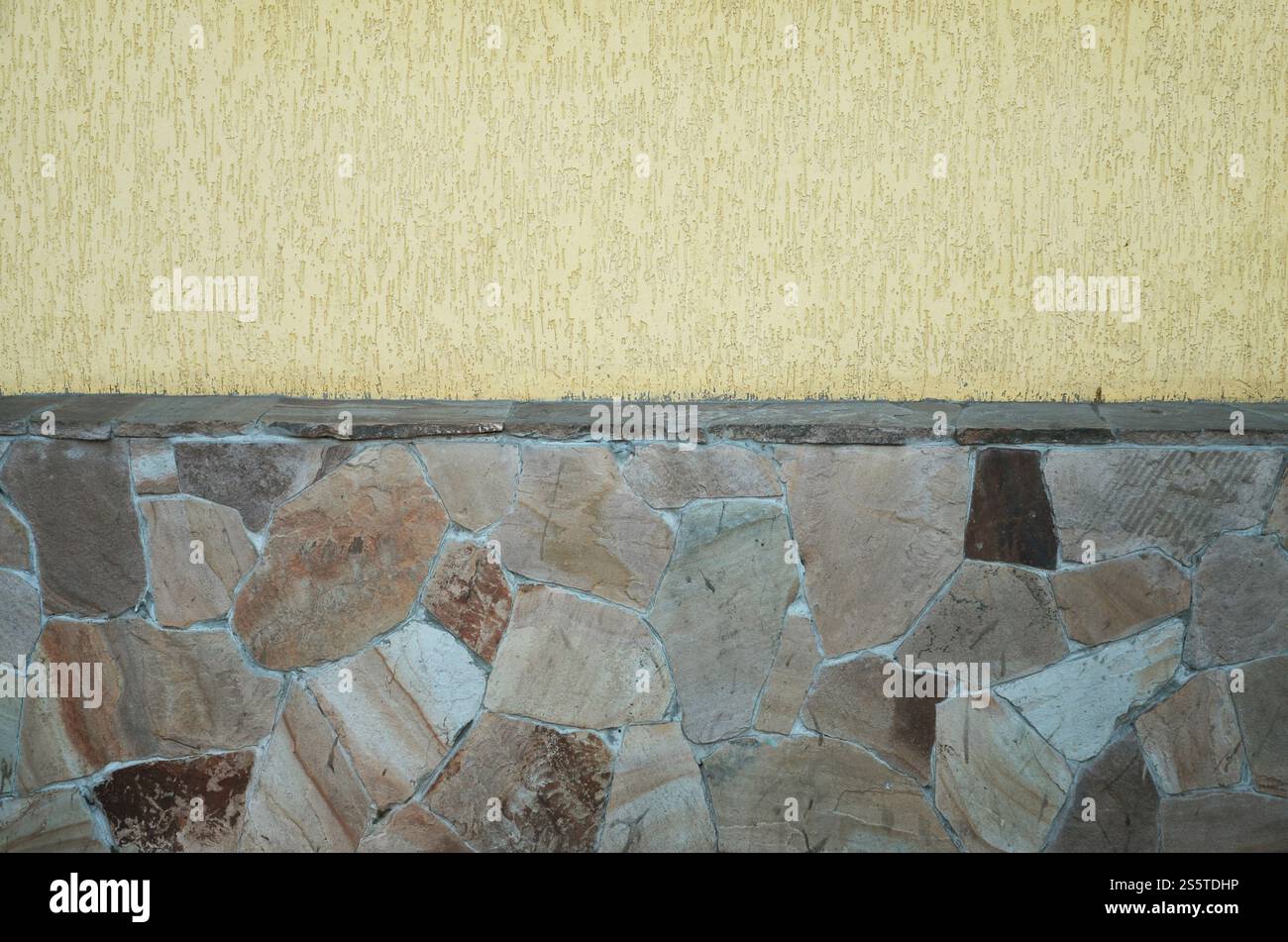 Concrete wall texture with colored plaster. Beautiful design facade ...
