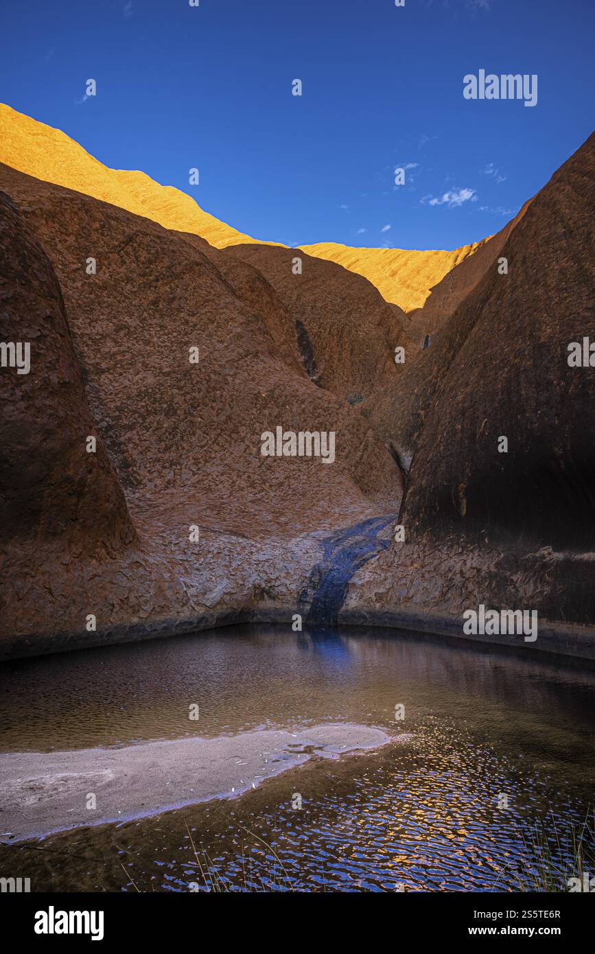 Uluru, formerly Ayers Rock, partial view, Mutitjulu waterhole, Uluru ...