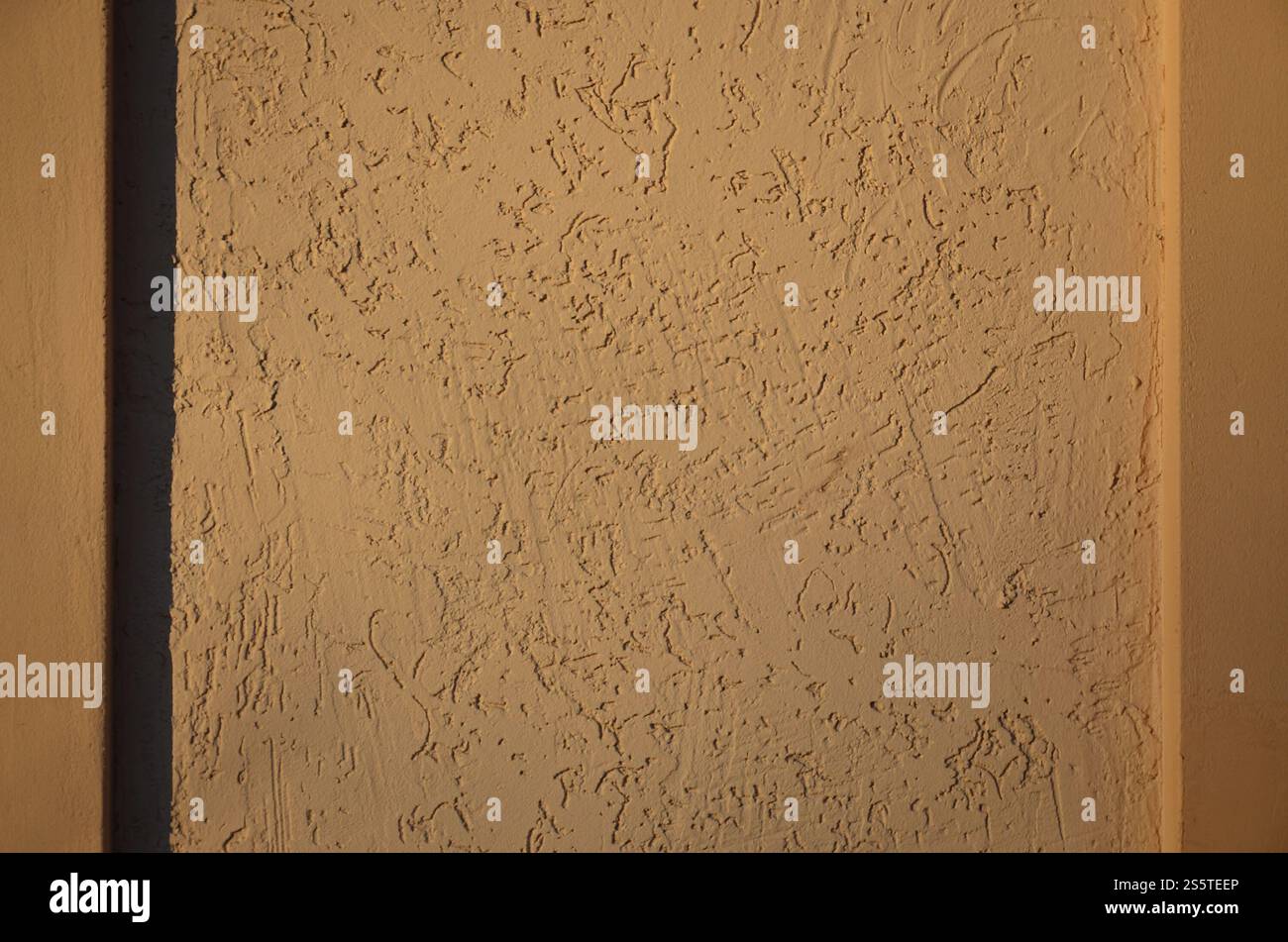 Concrete wall texture with colored plaster. Beautiful design facade ...