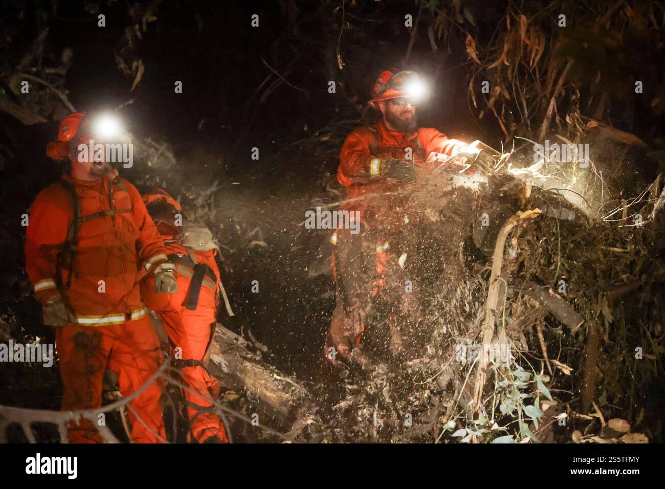 A California Department of Corrections hand crew works containment ...
