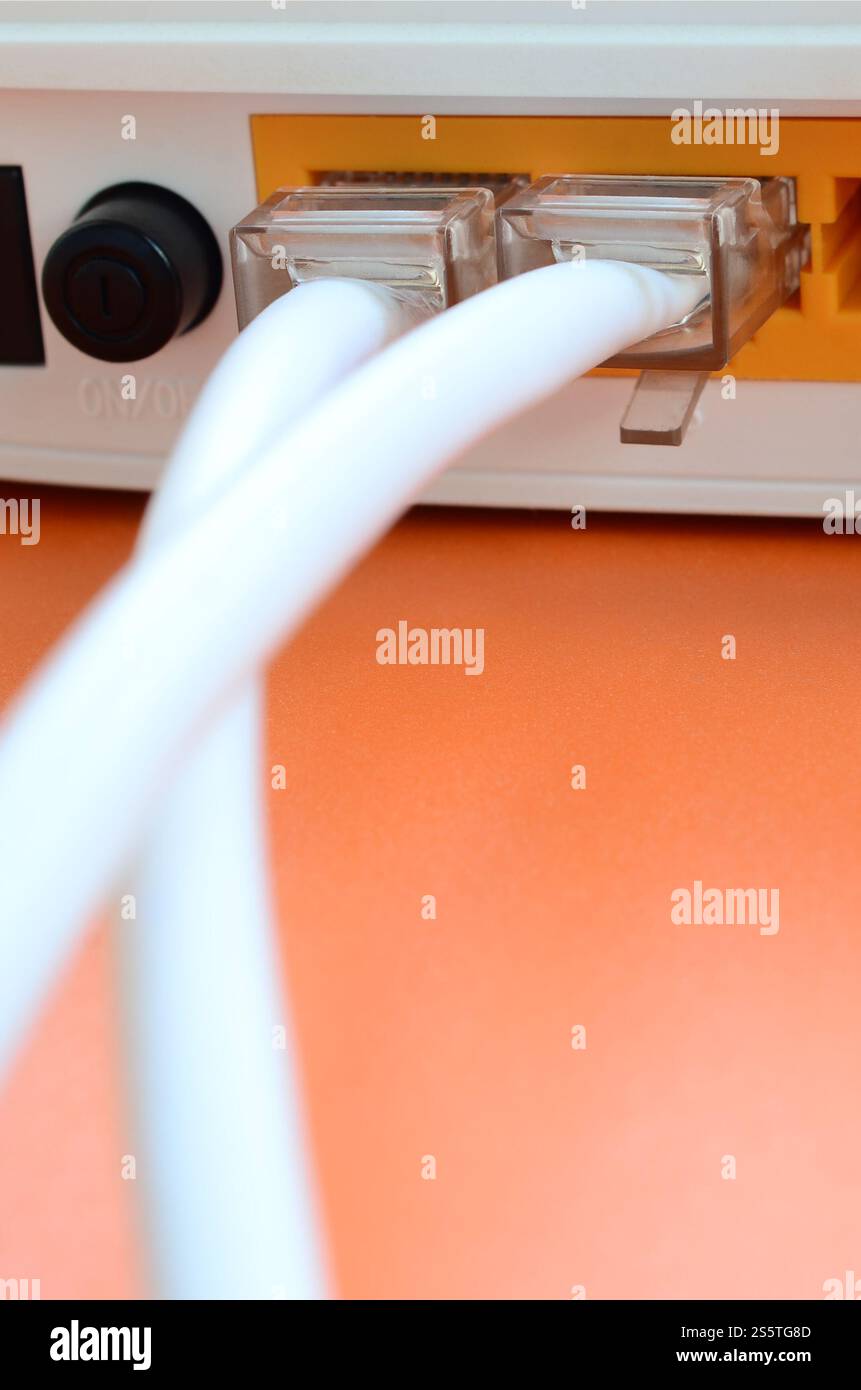 The Internet cable plugs are connected to the Internet router, which ...