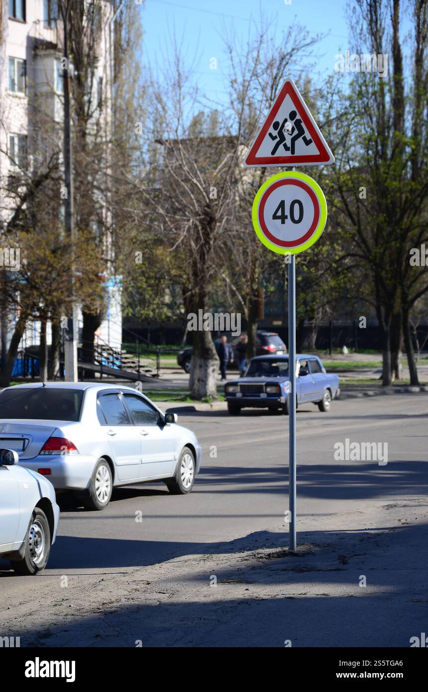 Road sign with the number 40 and the image of the children who run ...