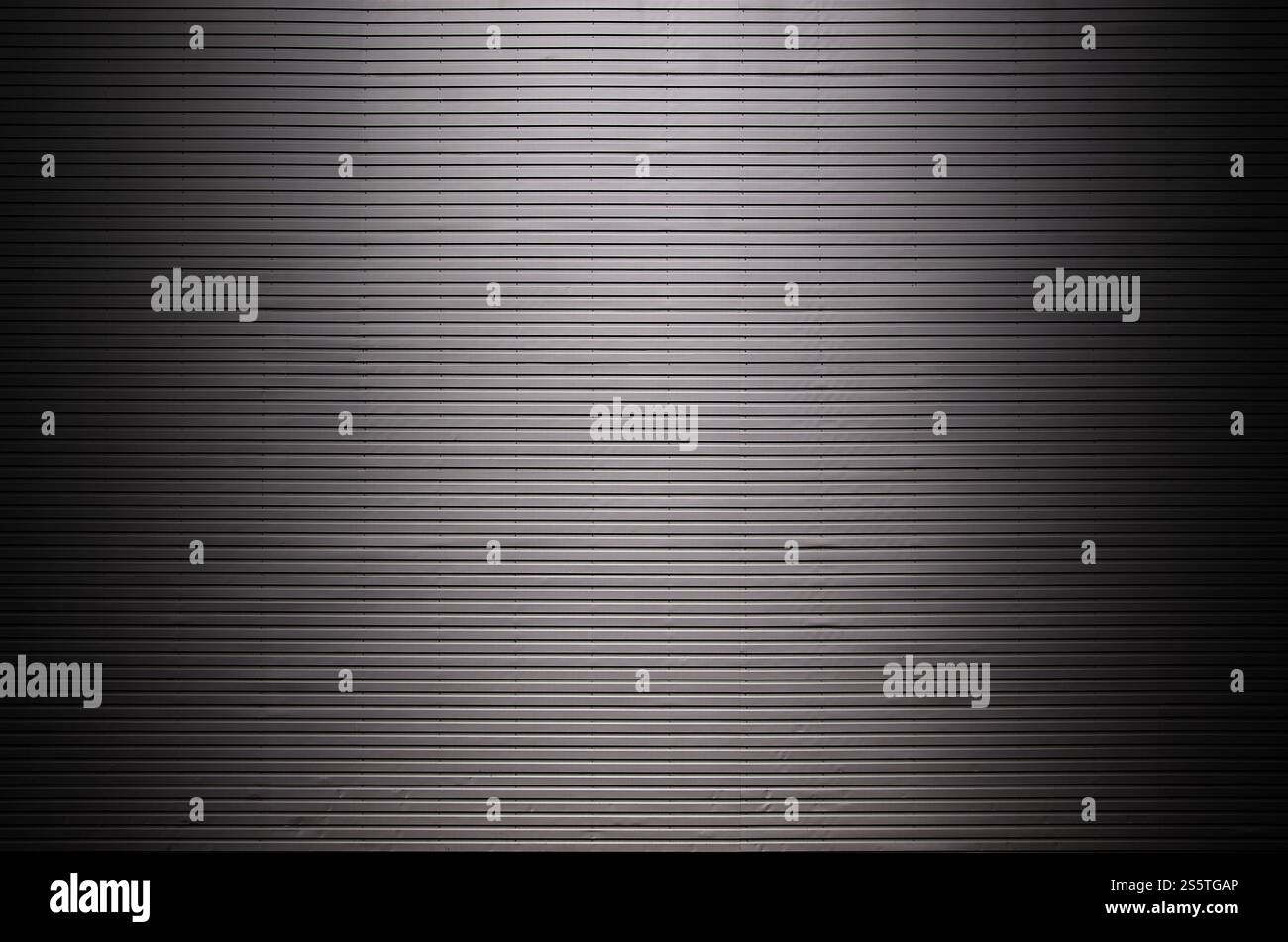The texture of a metal wall or a surface of corrugated metal with ...