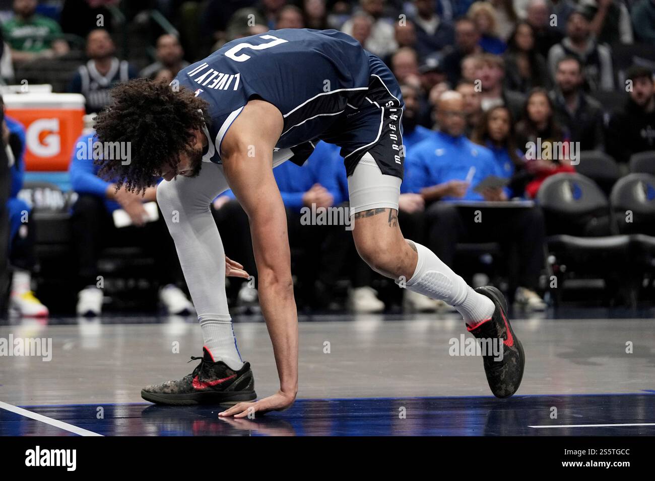 Dallas Mavericks center Dereck Lively II (2) gets up slowly after ...