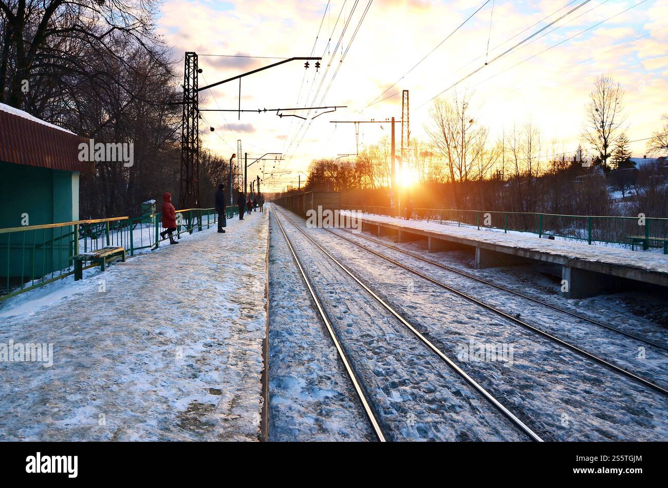 Photo of bright and beautiful sunset on a cloudy sky in cold winter ...