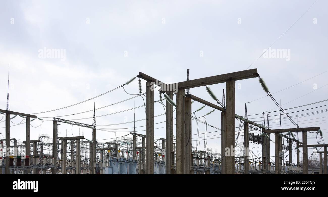 Power plant is a station of transformation. A lot of cables, poles and ...