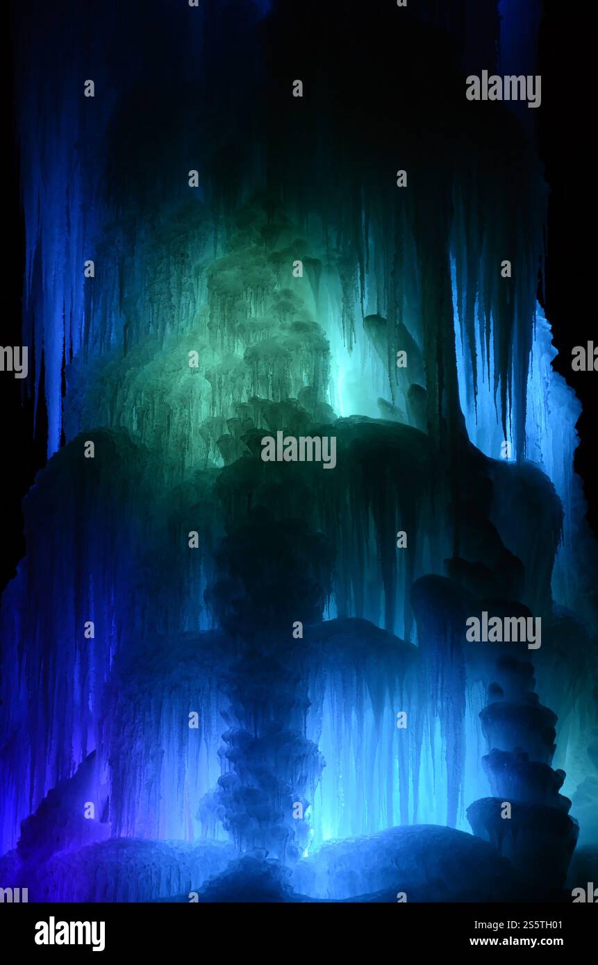 Huge ice icicles. Fragment of large blocks of ice frozen waterfall of ...