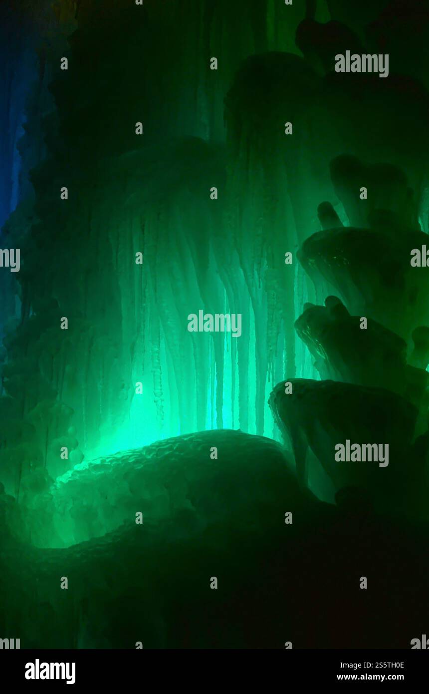 Huge ice icicles. Fragment of large blocks of ice frozen waterfall of ...