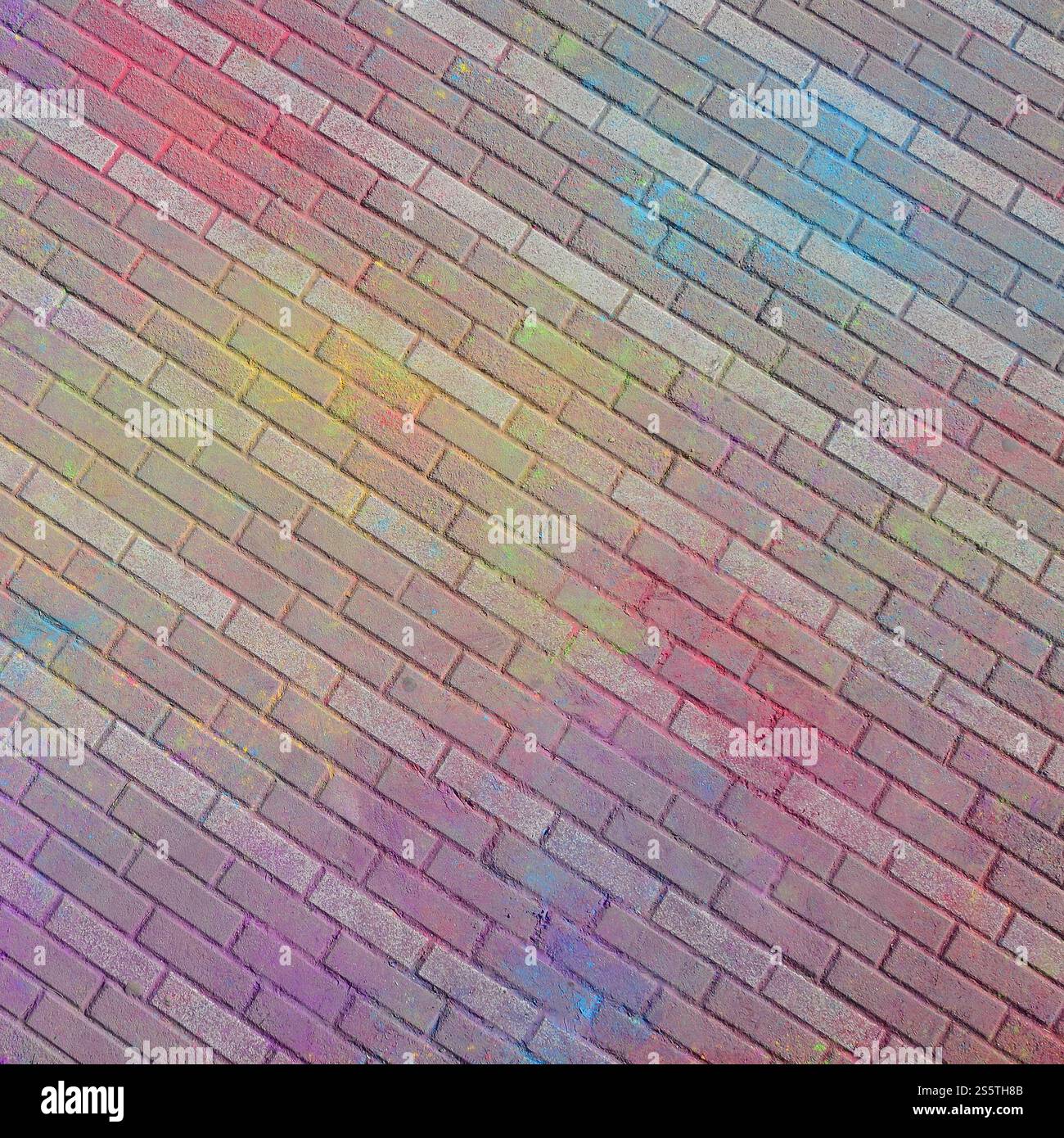 Multi colored earth, paving slabs, powder coated with dry colors at the ...