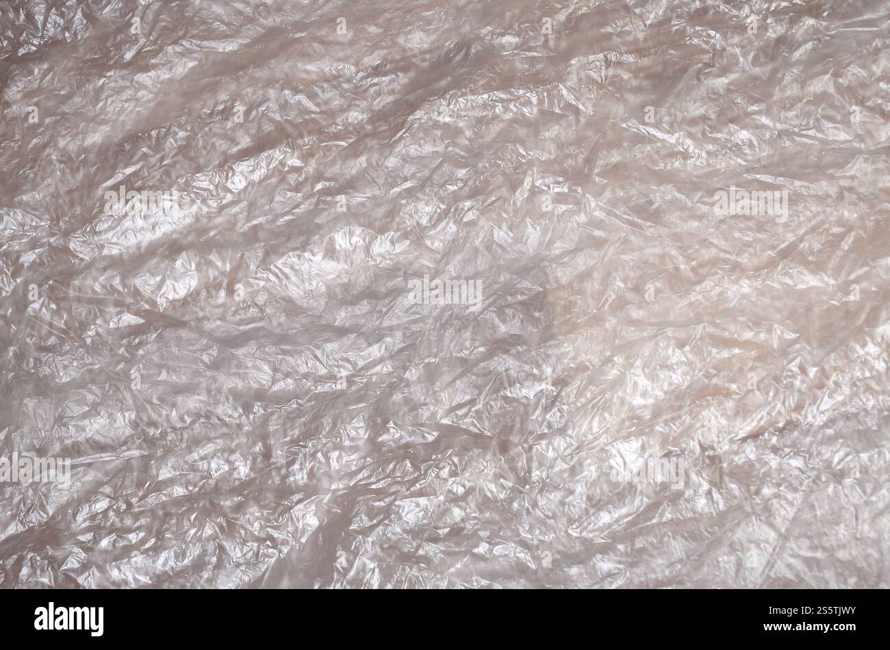Texture of white crumpled cellophane surface transparent on sunlight ...