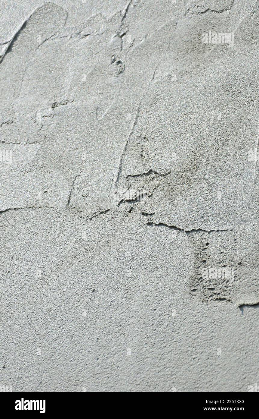 The texture of the wall, covered with gray foam polystyrene plates ...