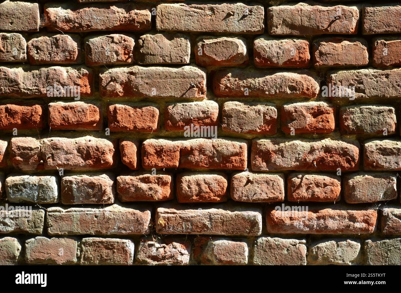 Horizontal wall texture of several rows of very old brickwork made of ...