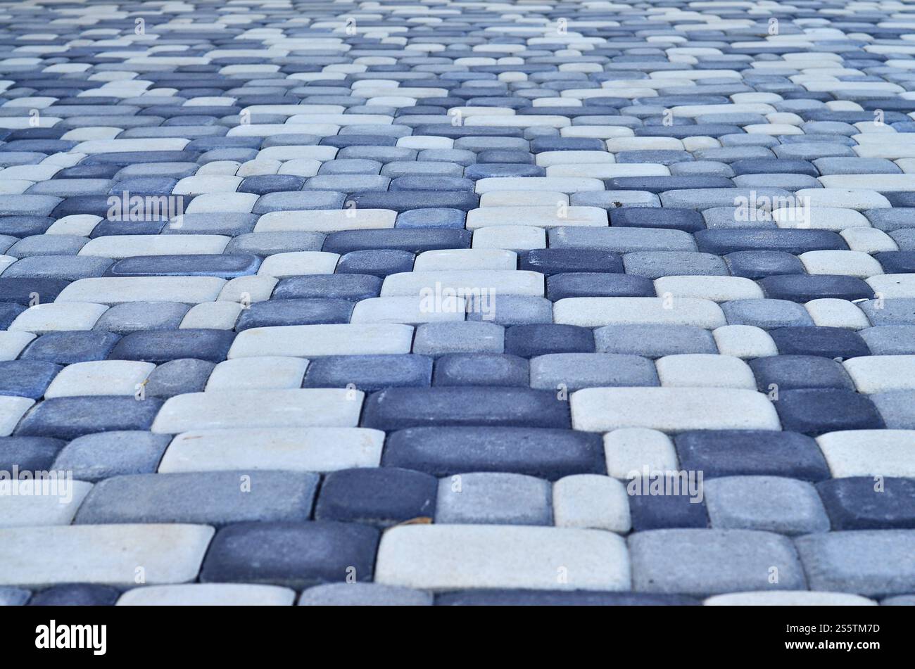 A detailed photo of the square, laid out of modern paving stone with ...