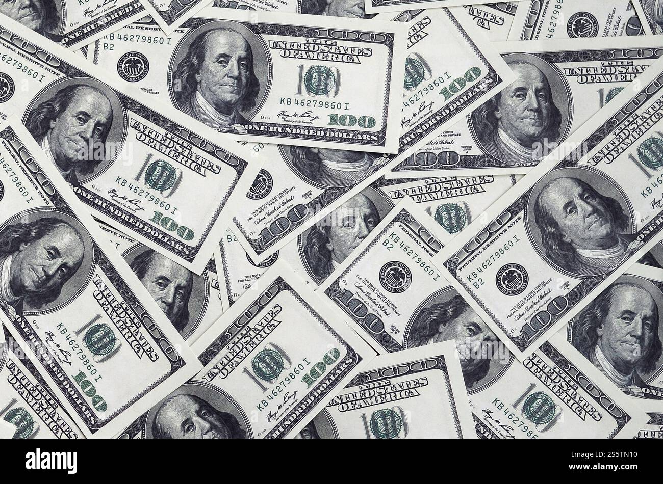 A pile of one hundred US banknotes with president portraits. Cash of ...