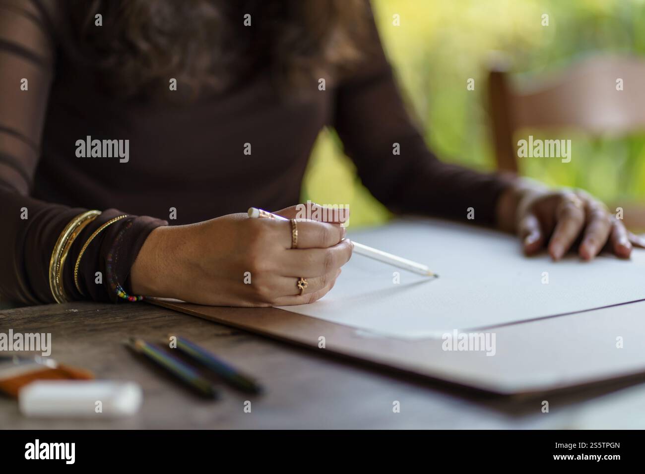 Artist drawing by pencil. woman drawing sketching Art Painting For ...