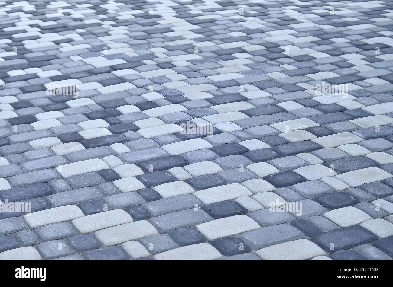 A detailed photo of the square, laid out of modern paving stone with ...