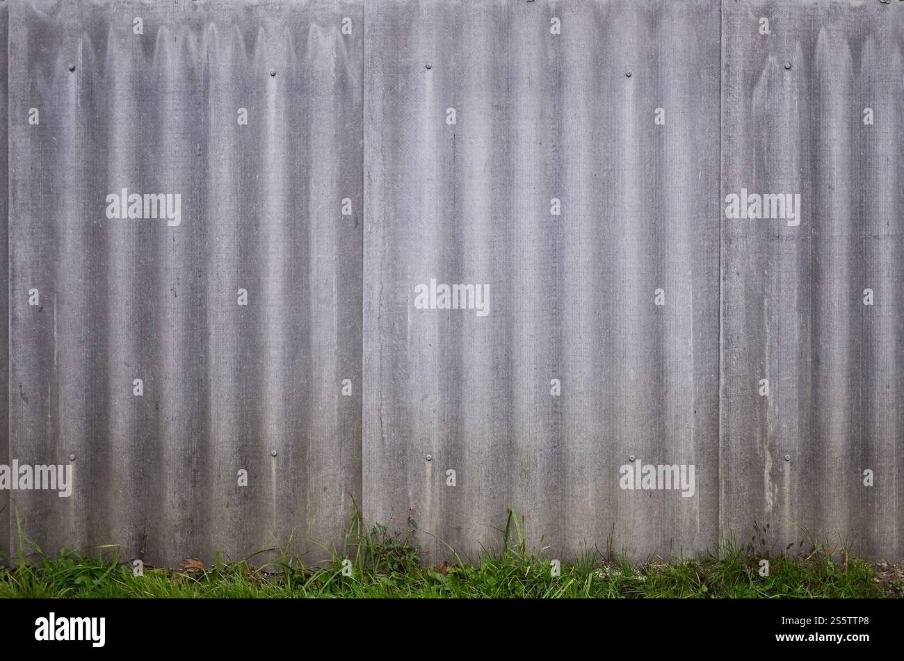 Grey slate texture. Close-up a Russian shiver fence. Grey slate texture ...