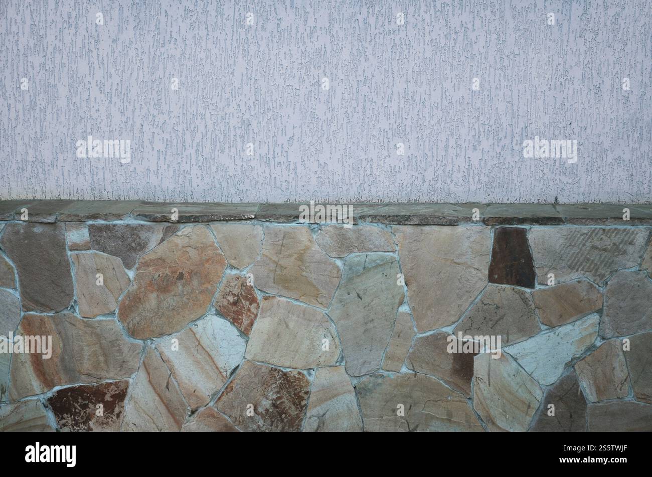 Concrete wall texture with colored plaster. Beautiful design facade ...