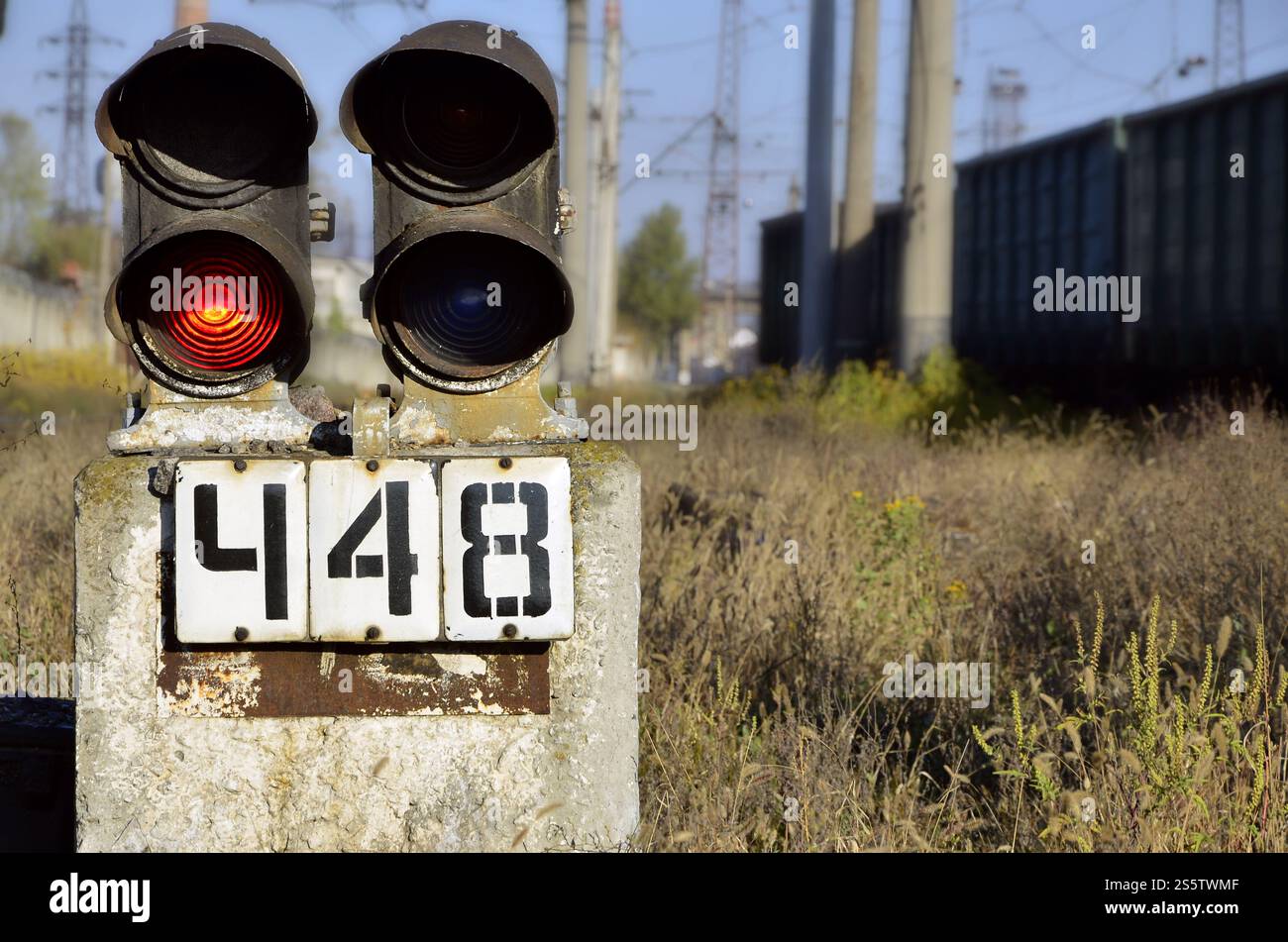 Railway landscape. Railroad sign (traffic light) with the railway ...
