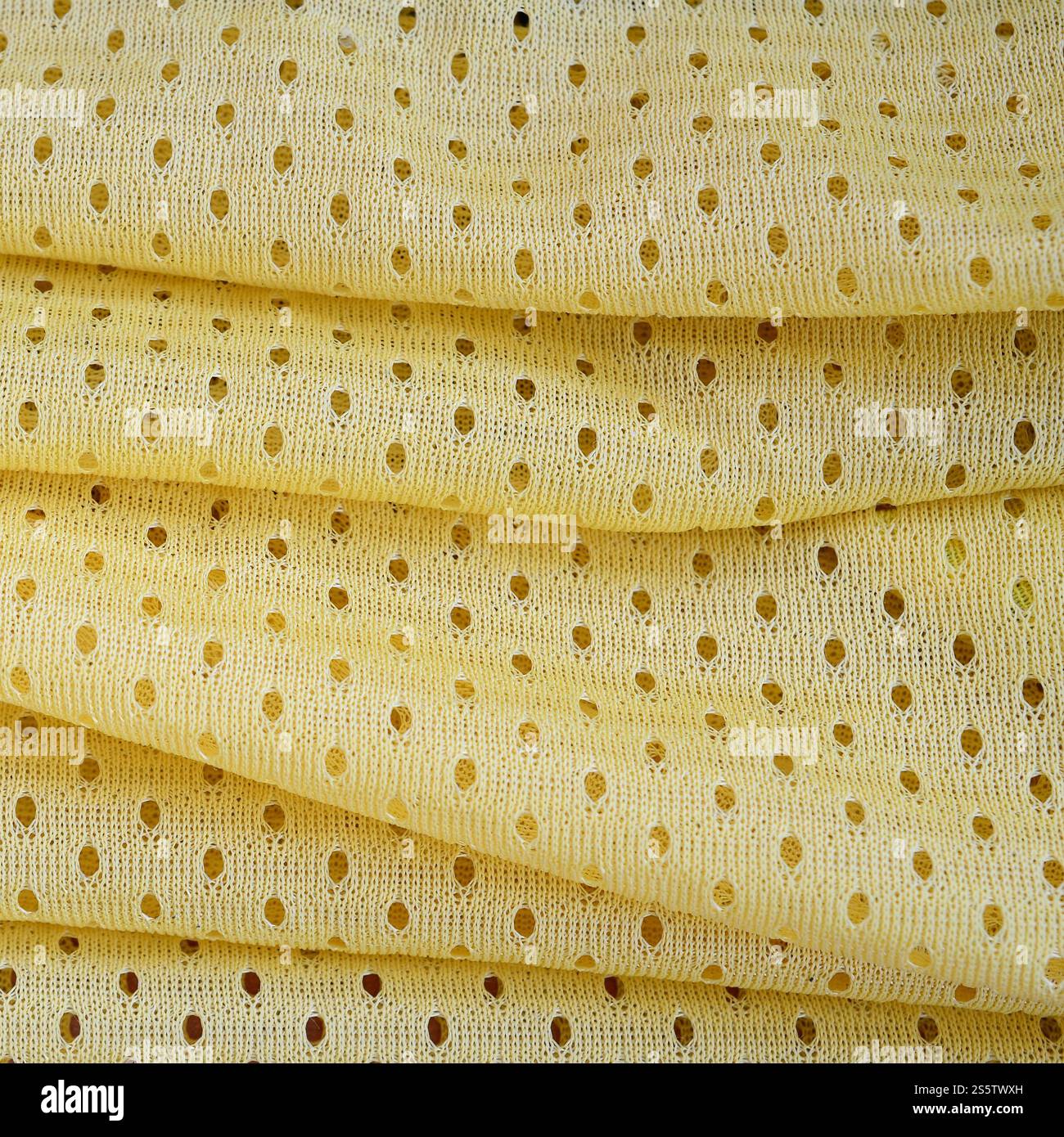Yellow mesh sport wear fabric textile pattern background. Yellow color ...