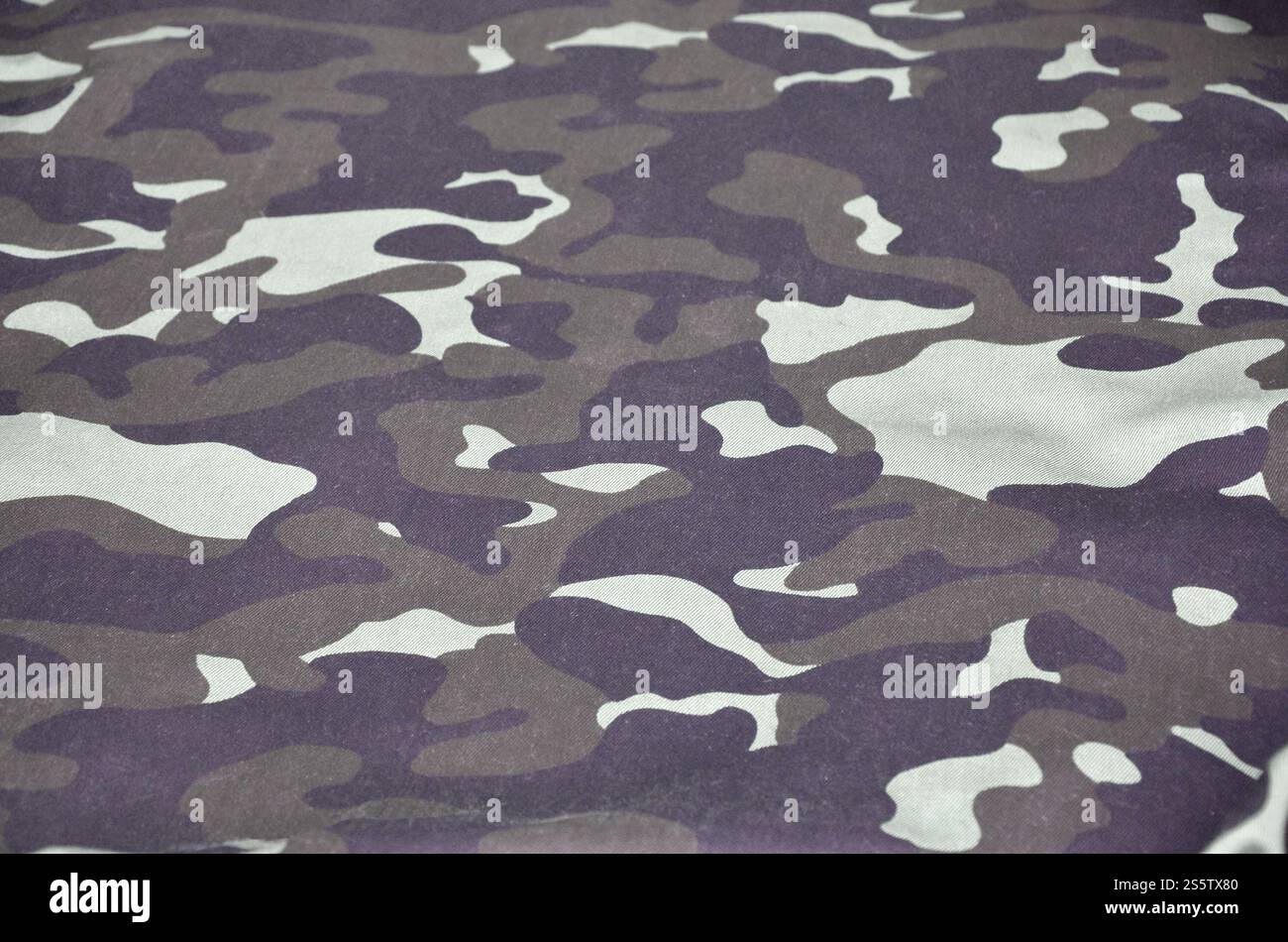 Texture of fabric with a camouflage painted in colors of the marsh ...