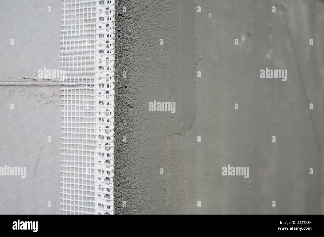 The texture of the wall, covered with gray polystyrene foam plates ...