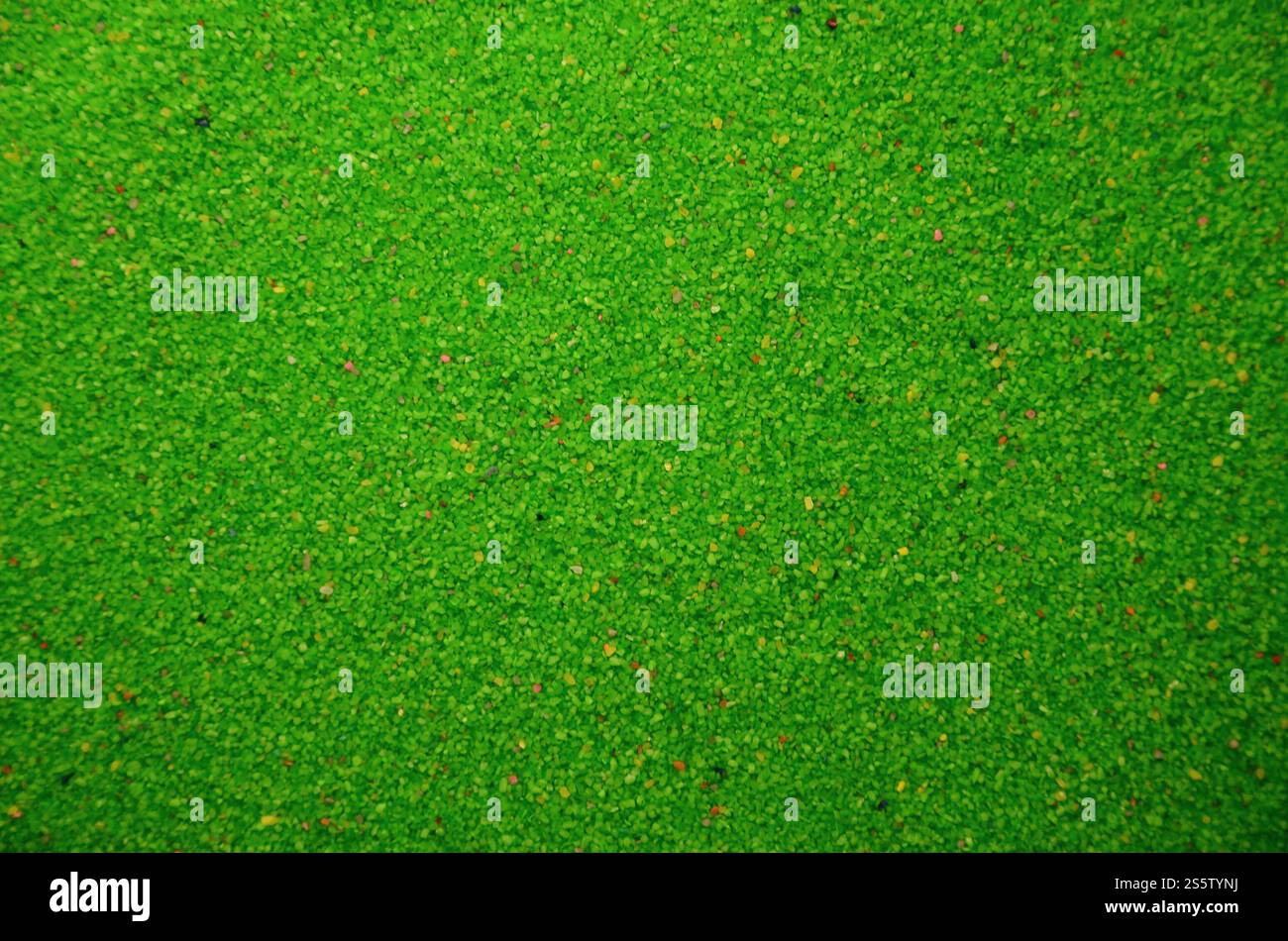 Texture of a colored granular sand close up. Green grains Stock Photo ...