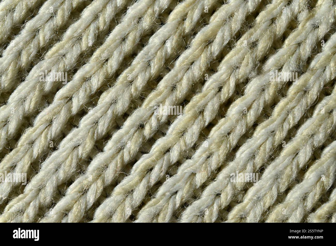 Fabric texture of a soft yellow knitted sweater. Macro image of the ...