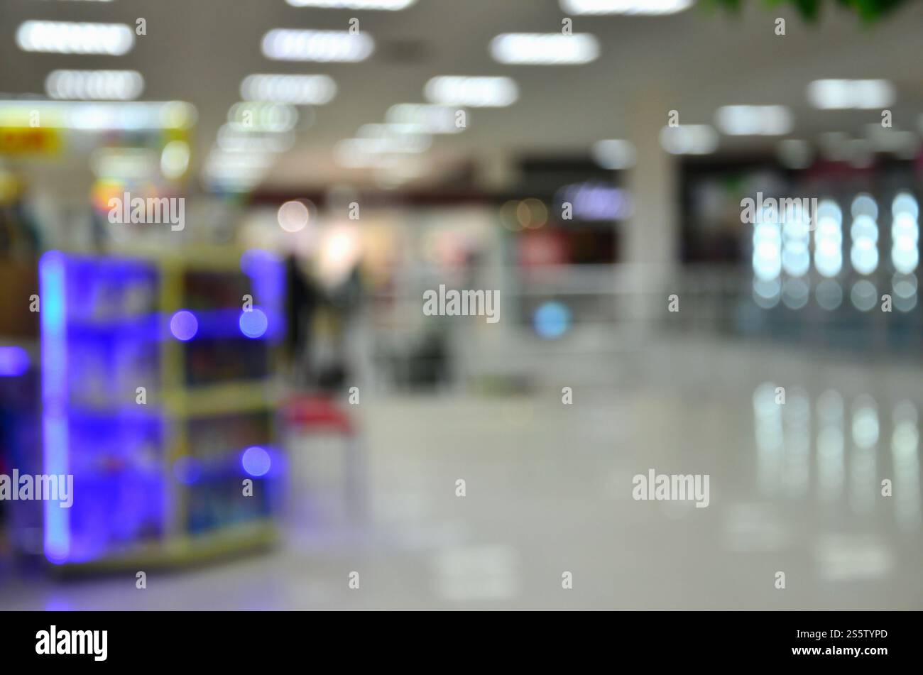 Defocused image of the interior spacious trading hall with a mass of ...