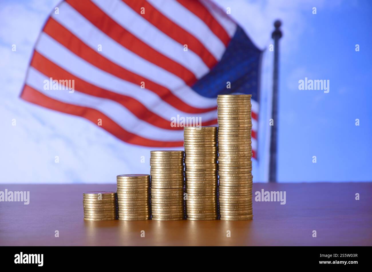 Golden coin stacks arranged as a graph. Increasing columns of coins ...