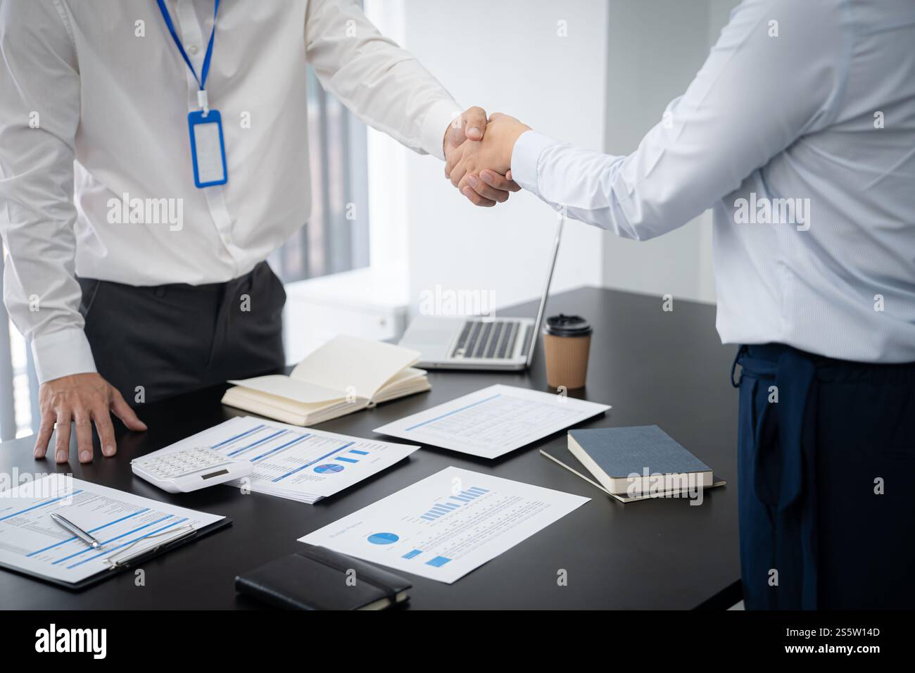 Businessman shaking hands successful making a deal. mans handshake ...