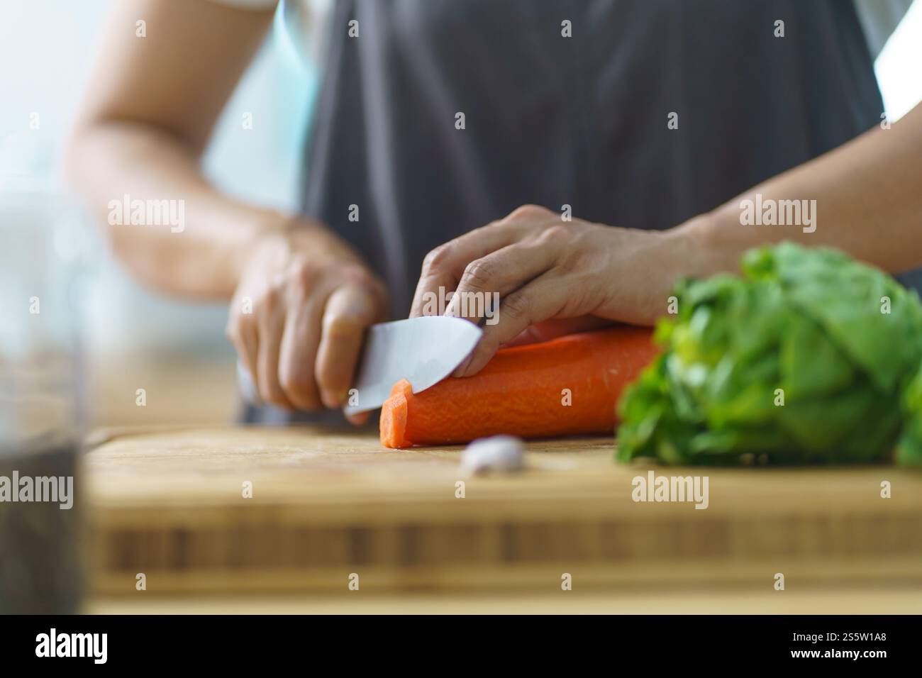 Prepare food woman is preparing vegetable salad in the kitchen Healthy ...