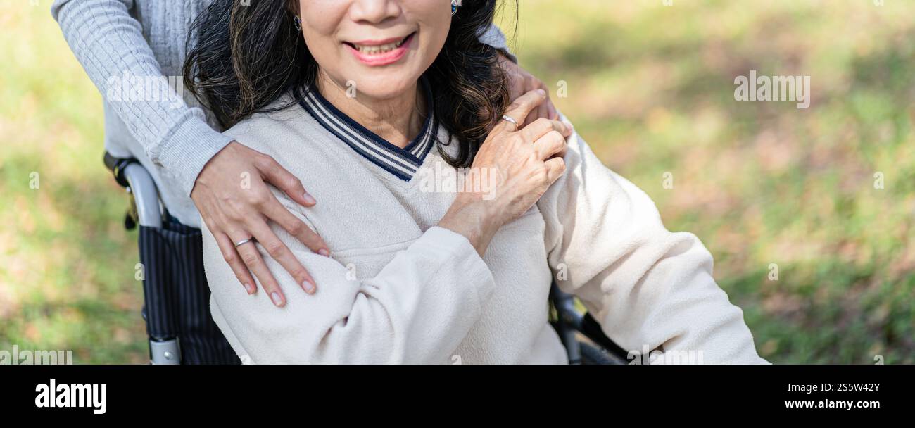Family relationship Asian senior woman in wheelchair with happy ...
