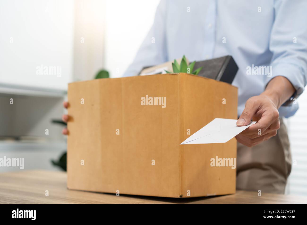 sending resignation letter to boss and Holding Stuff Resign Depress or ...