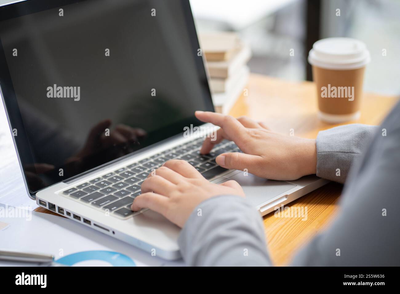 Business Woman working by using laptop computer Hands typing on a ...