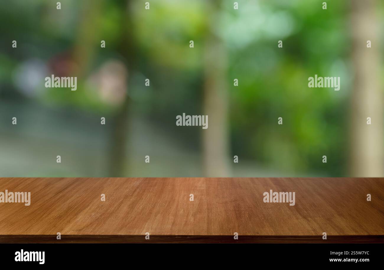 Empty wood table top and blur of out door garden background Empty ...