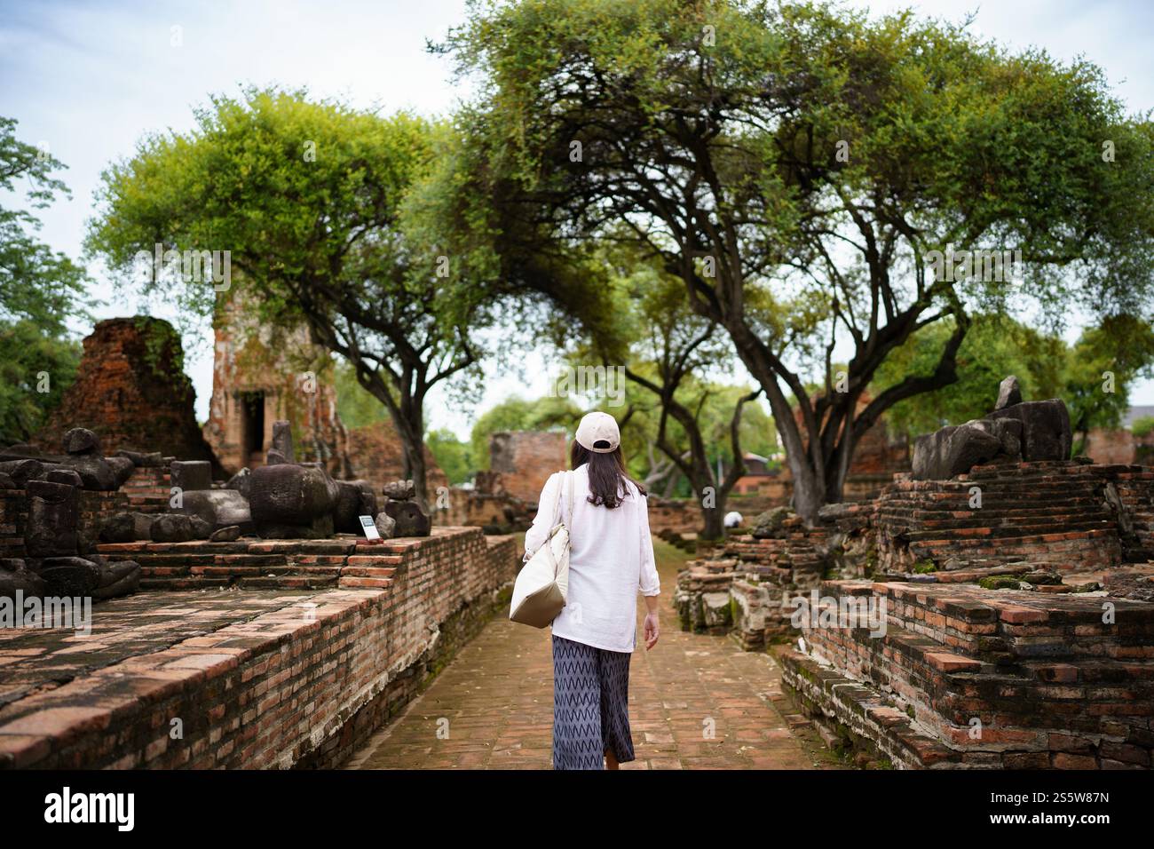 Summer Travel archaeological site in Asia. Asian woman traveler temple ...