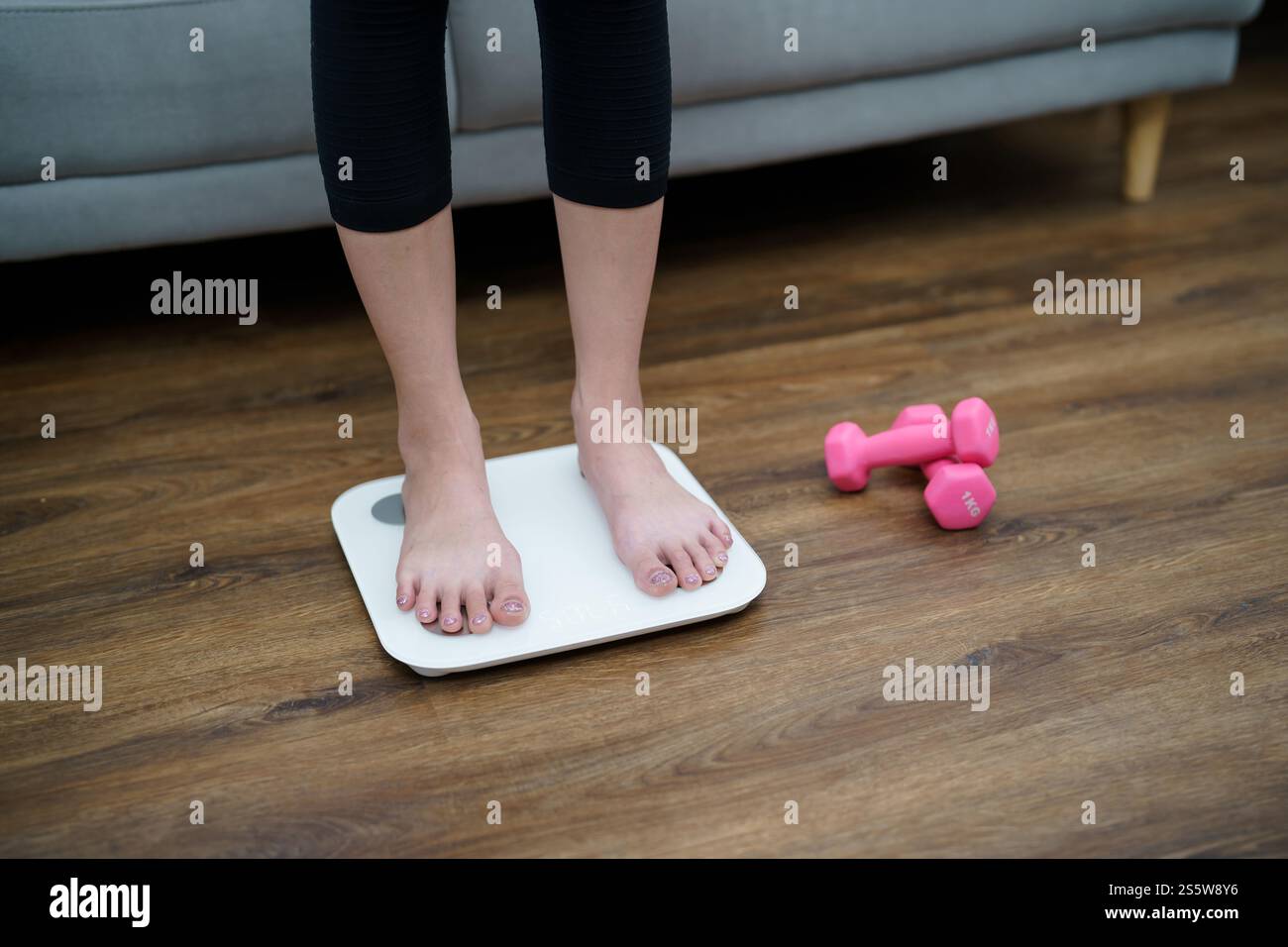 Fat diet and scale feet standing on electronic scales for weight ...