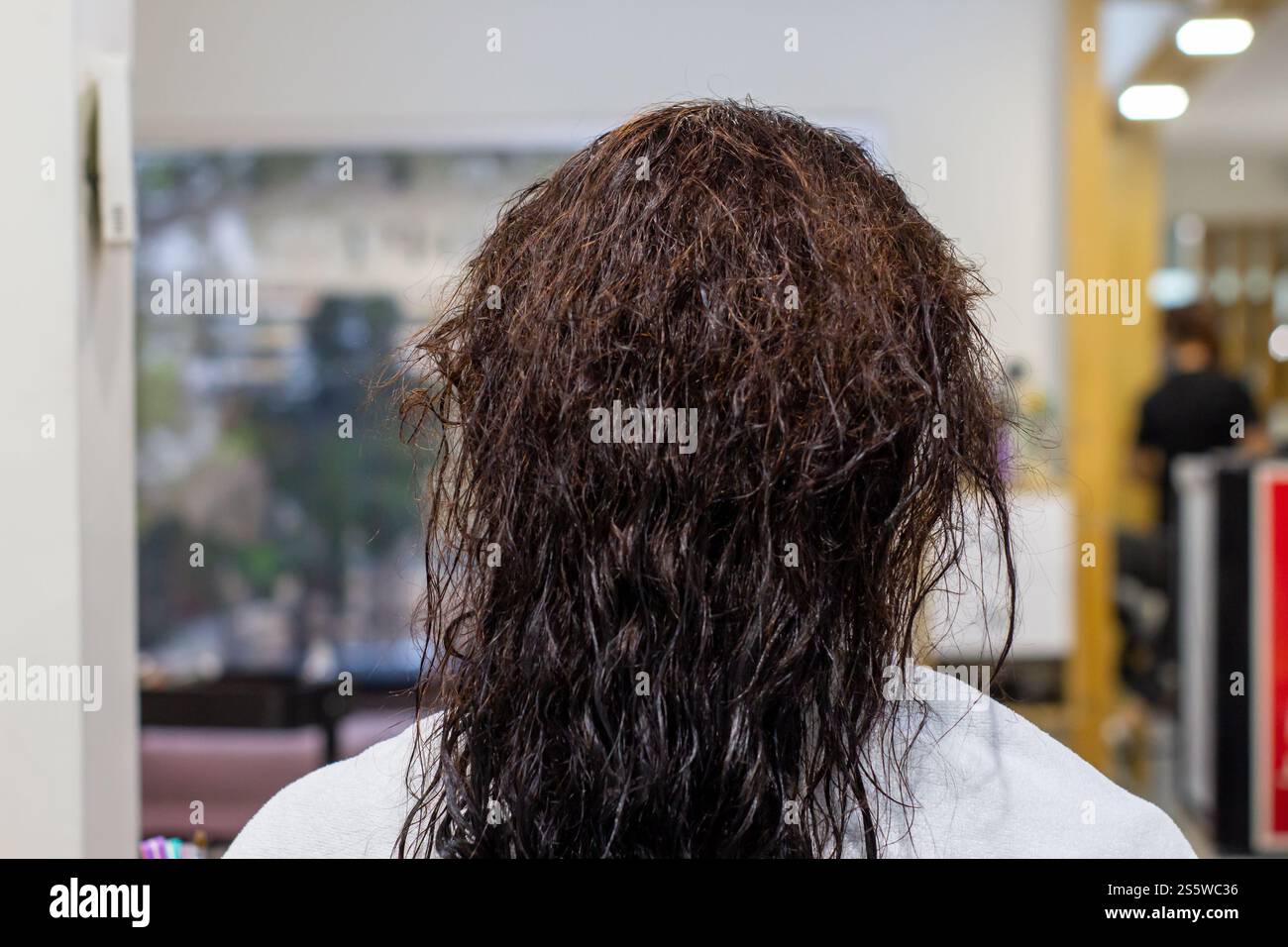 Wet and messy woman's hair after showering. Care with beautiful ...