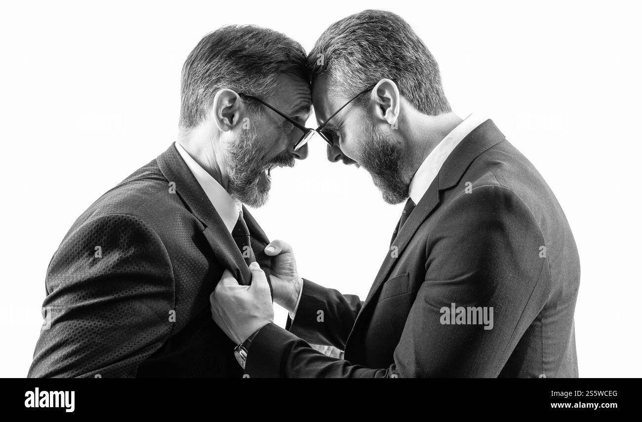 two businessmen fighting at rivalry isolated on white. businessmen ...